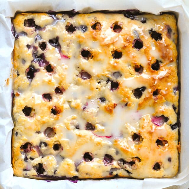 Blueberry Lemon Drizzle Cake. An easy poke cake everyone will love!
