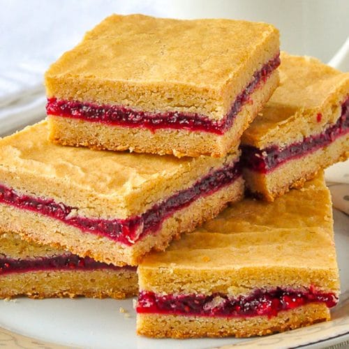 Raspberry Filled Cookie Bars. A time saving one pan version.