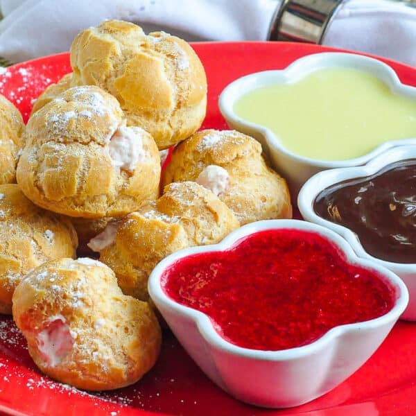 Raspberry Cream Profiteroles with 3 Dipping Sauces, perfect for sharing